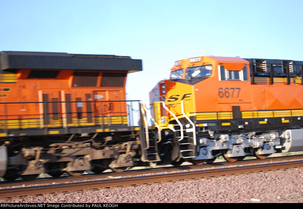 BNSF 6677 zooms by me as she heads eastbound as a #2 unit on a Hot Z.